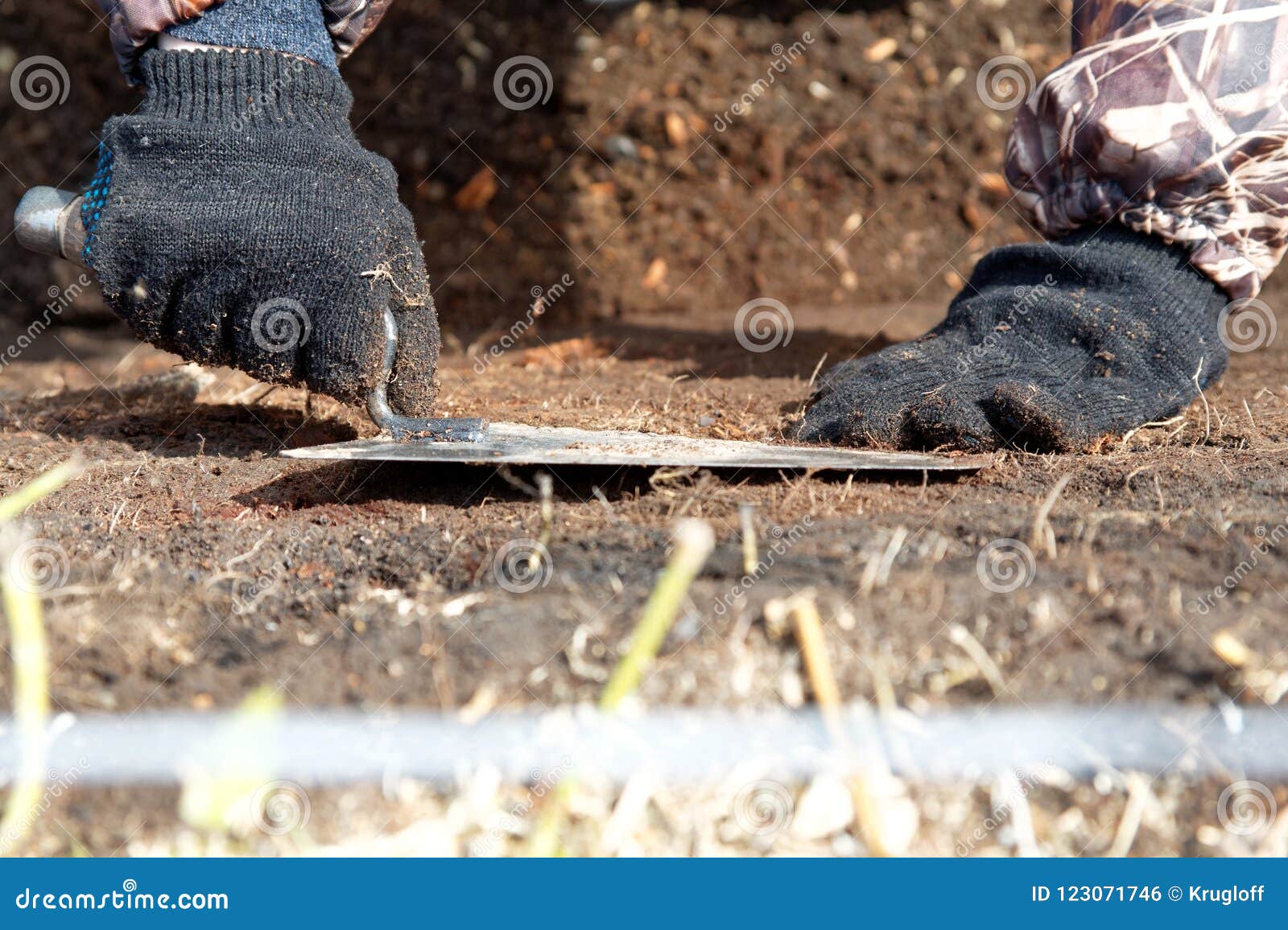 Hands Of An Archaeologist Measuring With A Ruler Medieval Arrowhead ...