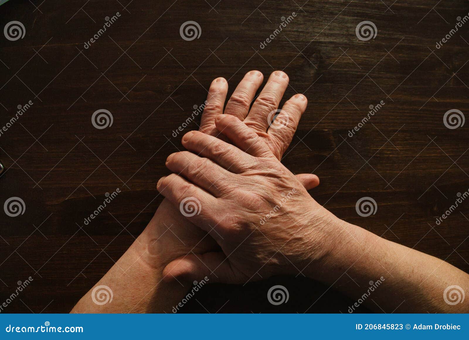 Hands and Arms of Old Man on Wooden Surface Stock Image - Image of ...