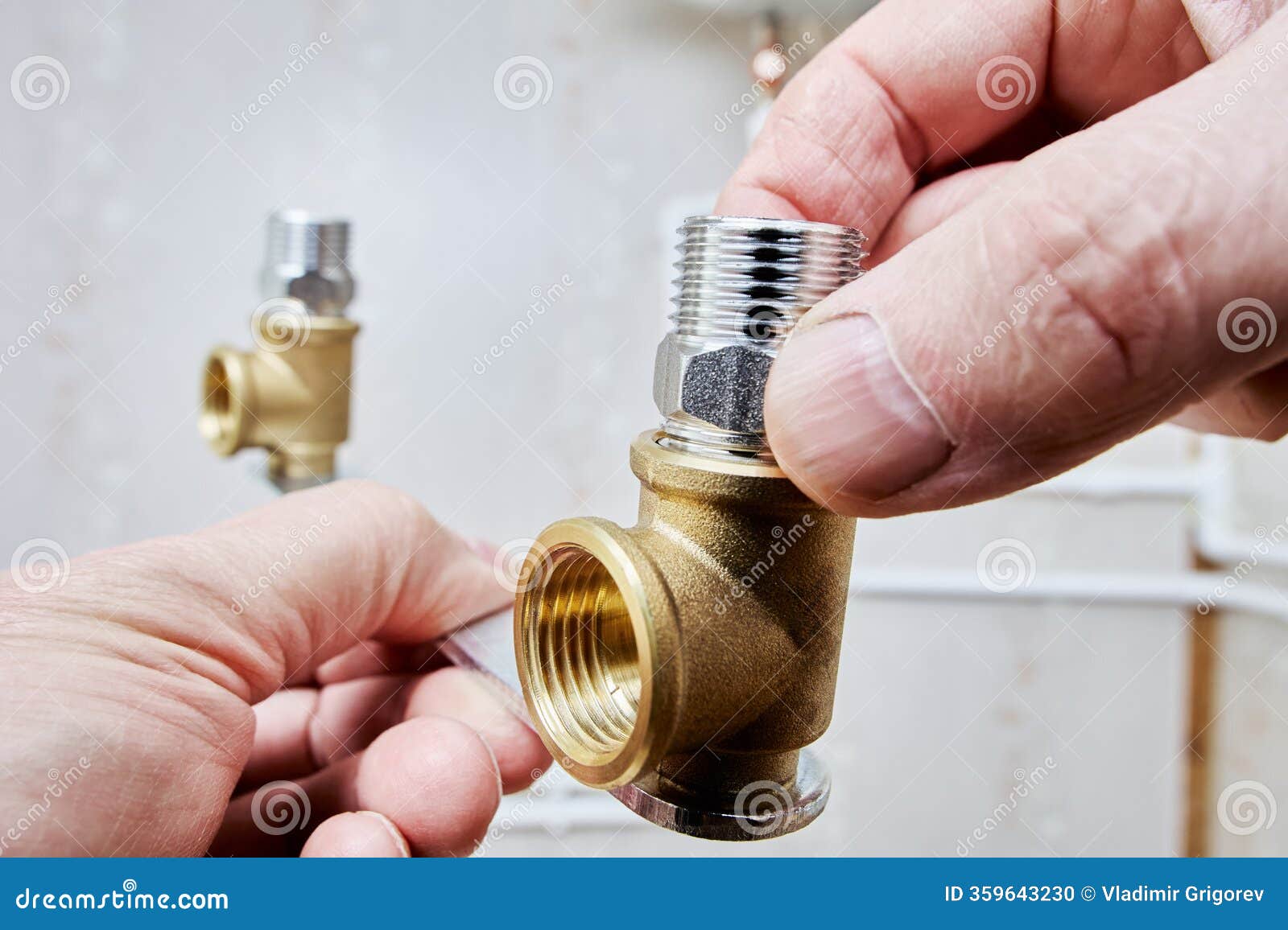 Hands Assembling Plumbing Parts with Threaded Adapter. Stock Photo ...