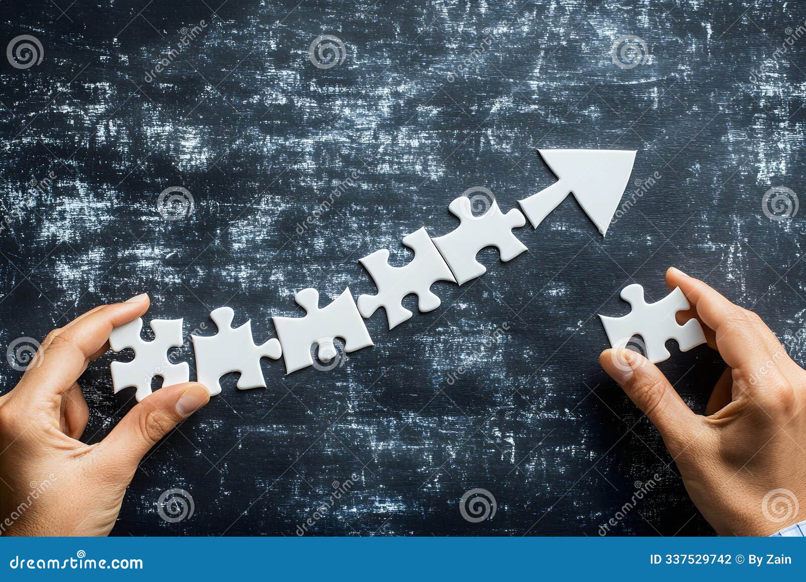 Hands Assembling Puzzle Pieces into Upward Arrow Shape Representing ...
