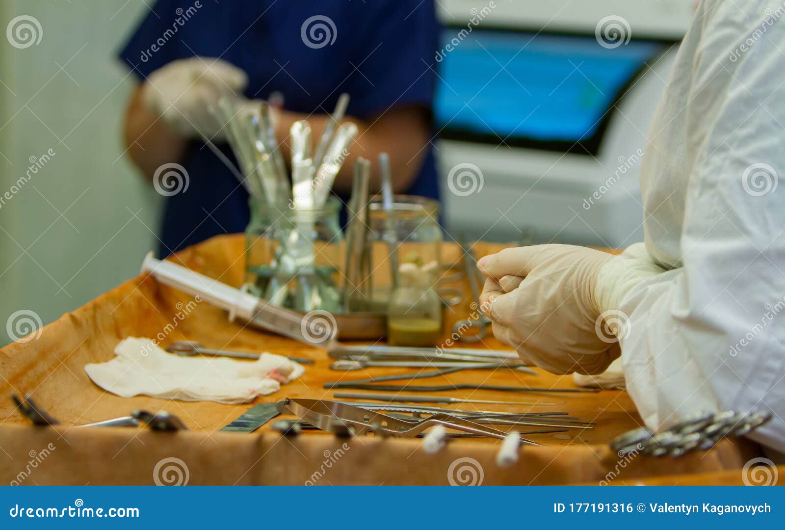 Hands of assistant surgeon stock photo. Image of assistant - 177191316