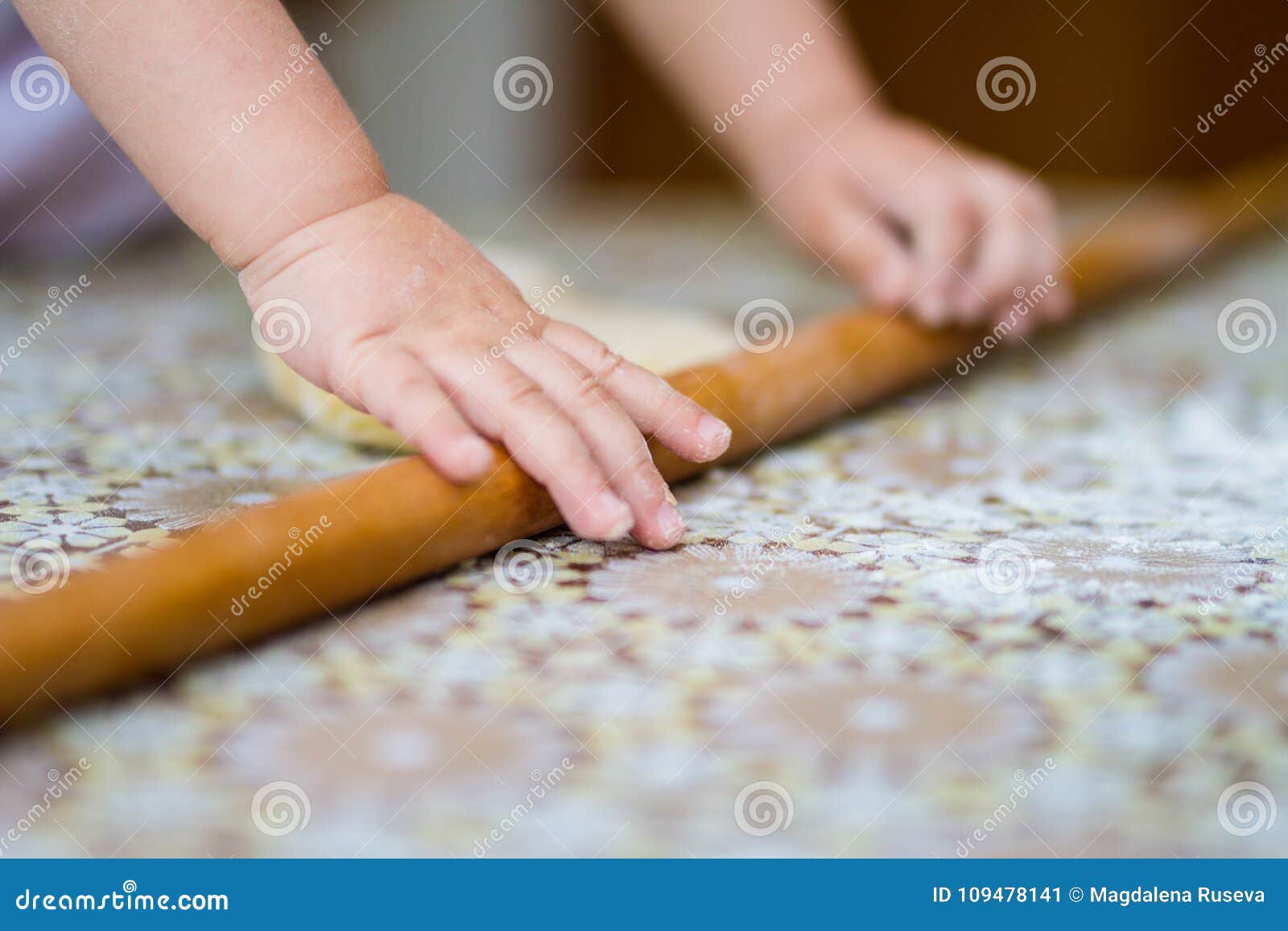 Hands Baking Dough with Rolling Pin on Table. Little Chef Bake in ...