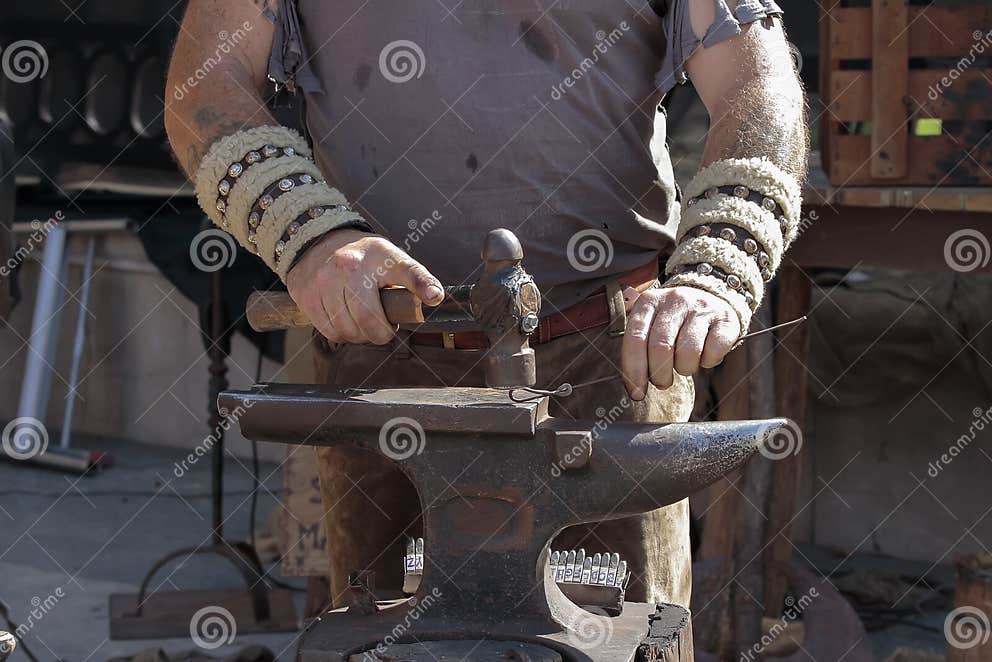 Hands of blacksmith stock image. Image of anvil, male - 81503567