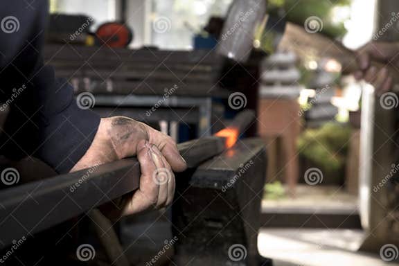 Hands of Blacksmith by the Work Stock Photo - Image of smith, tools ...