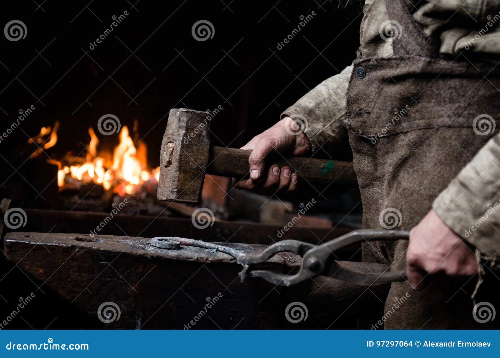 The Hands of a Blacksmith at Work in the Smithy Stock Photo - Image of ...