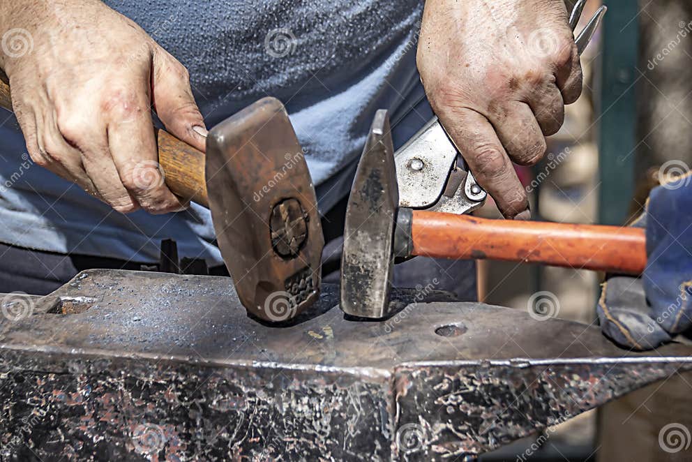 The Hands of Blacksmiths with Hammers Stock Image - Image of equipment ...