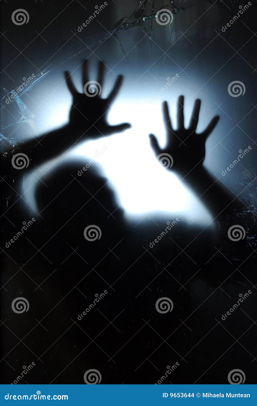 Hands on a Blue Broken Window Stock Photo - Image of broken, self: 9653644