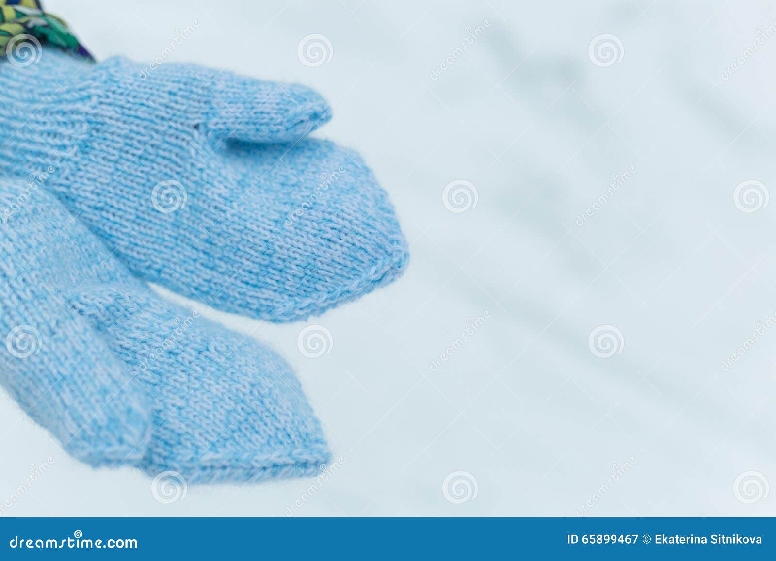 Hands in Blue Knitted Mittens in Snow Stock Image - Image of knitted ...