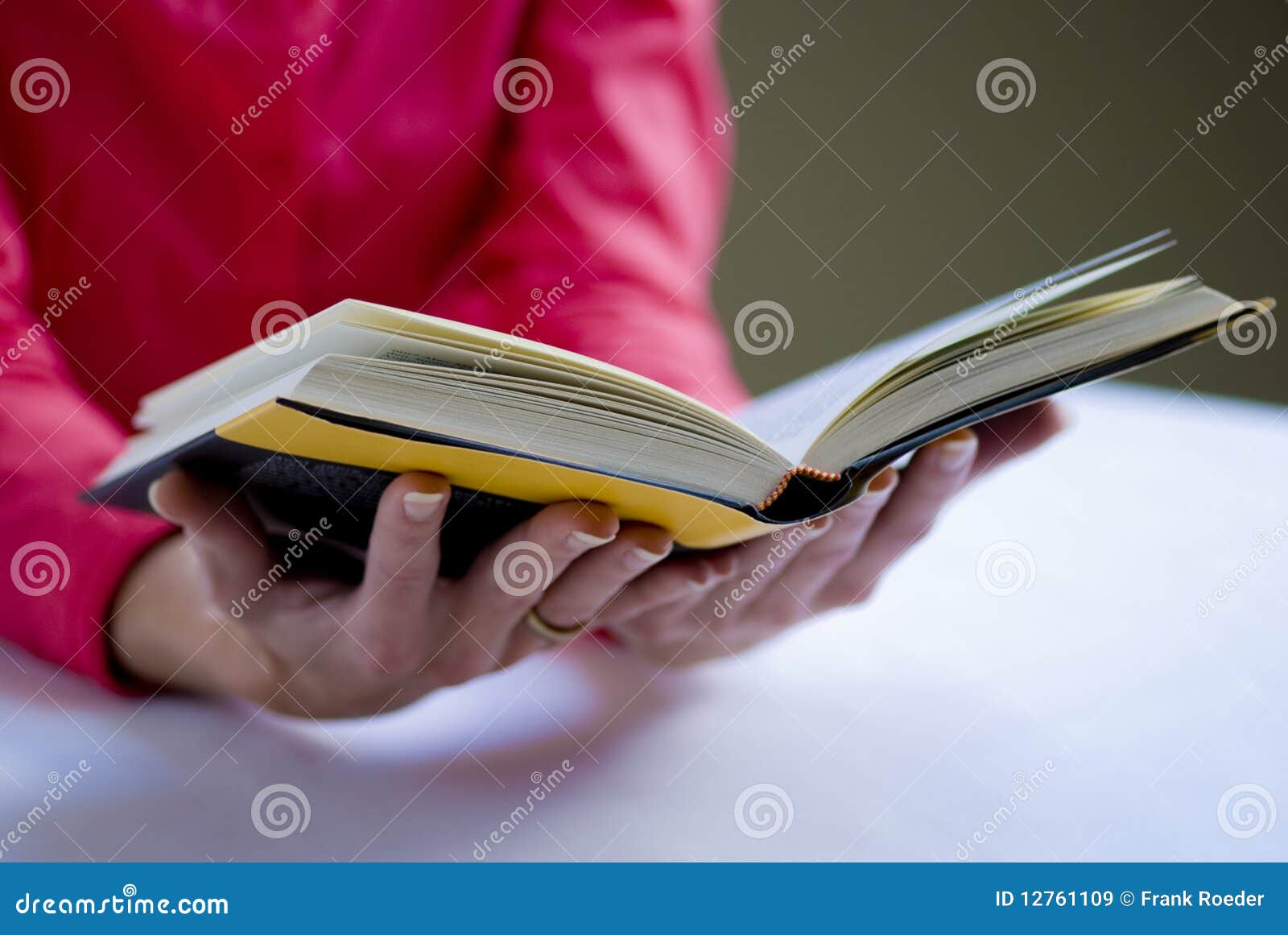 Hands with book stock image. Image of fuzzy, landscape - 12761109