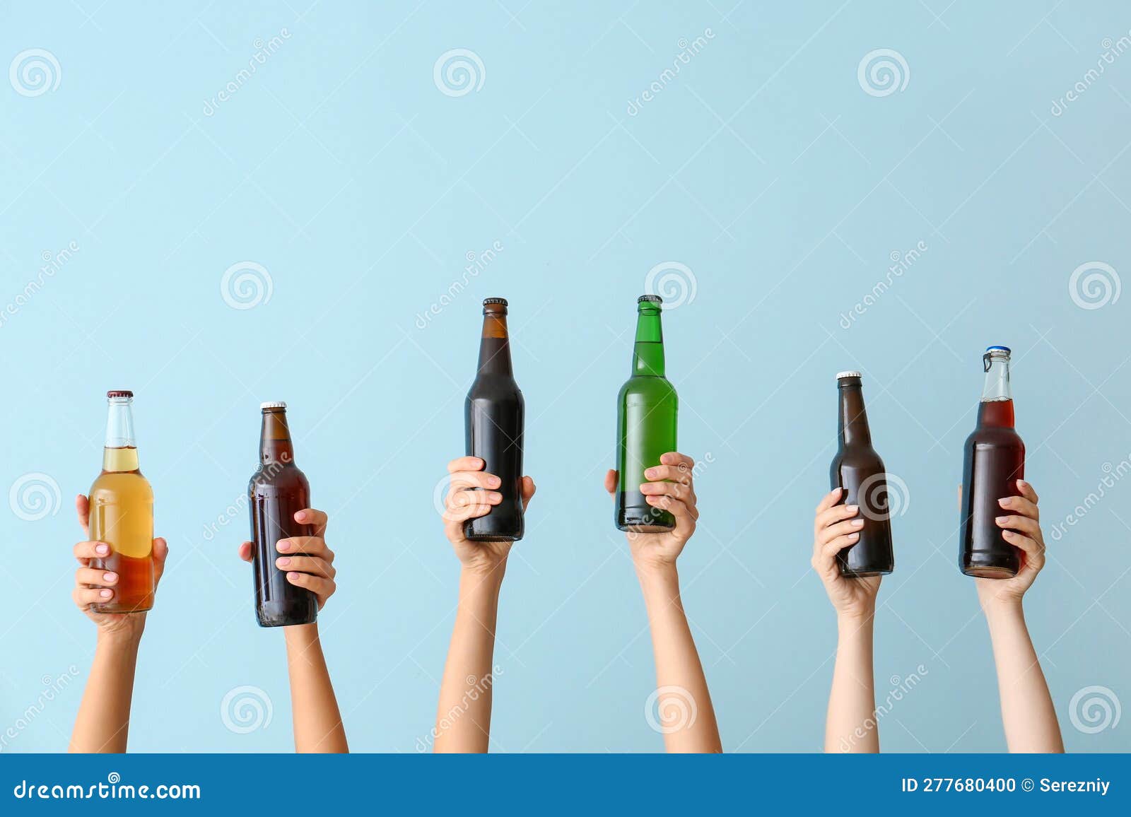 Hands with Bottles of Beer on Color Background Stock Photo - Image of ...