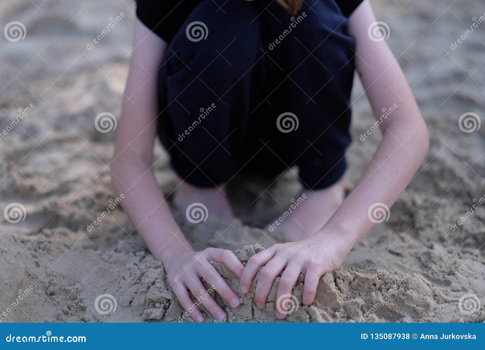 Hands of a Boy Playing in the Wet Sand Stock Photo - Image of playing ...