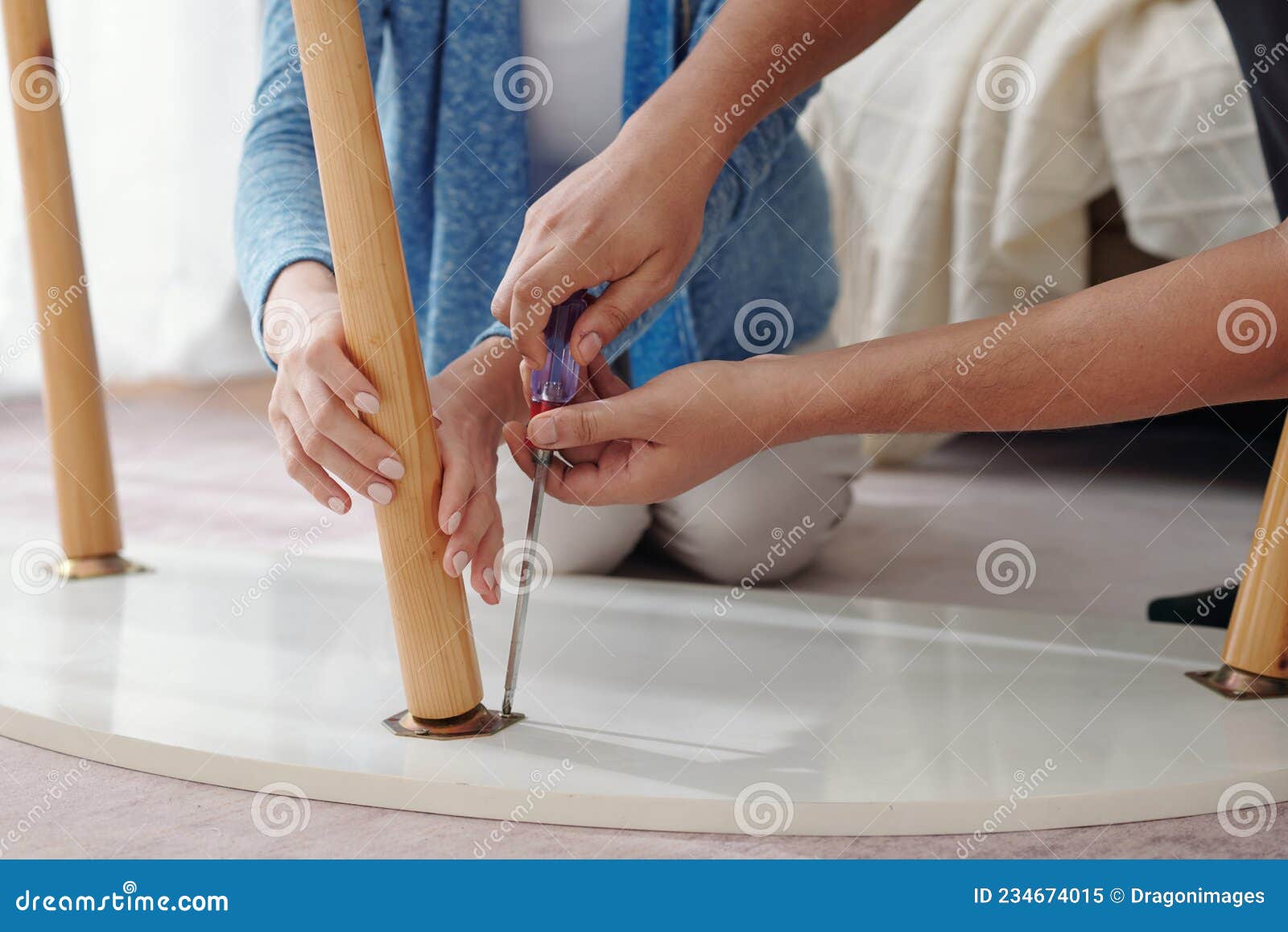 Hands Fixing Broken Table stock image. Image of preparation - 234674015