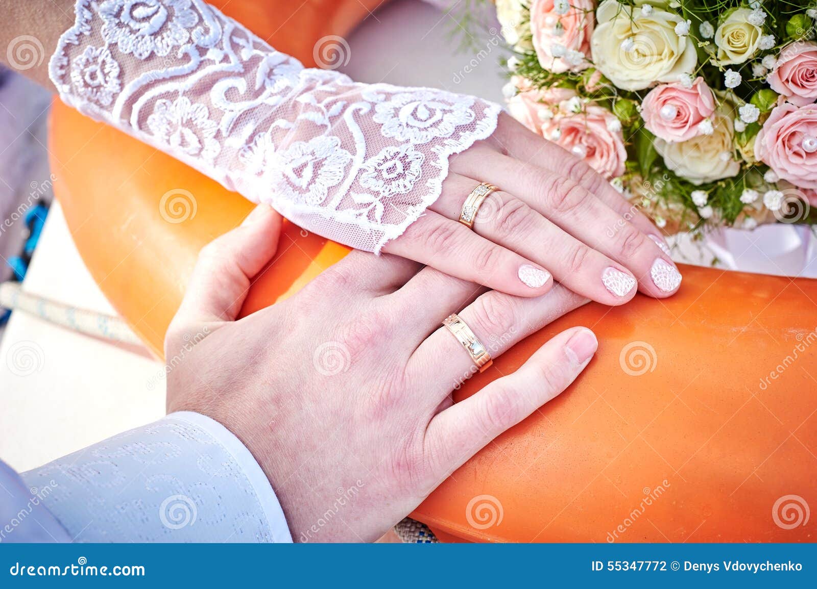 Hands of the Bride and Groom with Rings on a Beautiful Wedding Stock ...