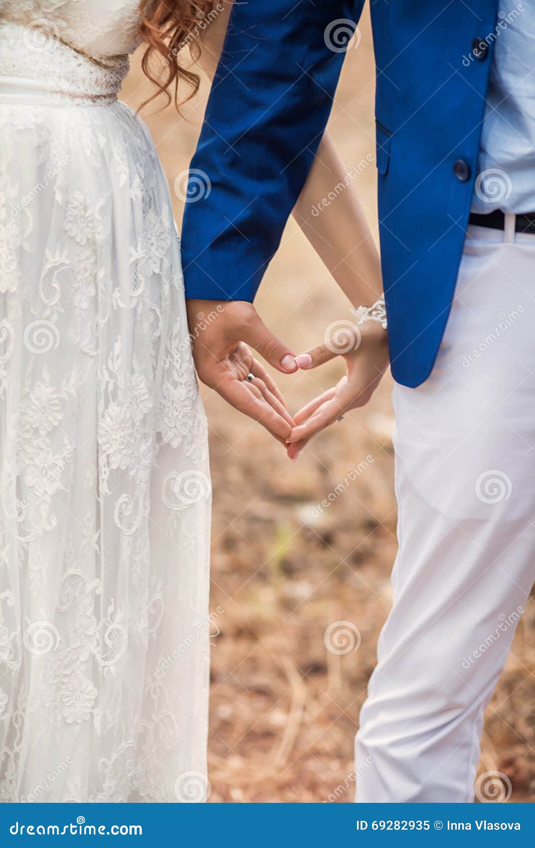 Hands of bride and groom stock image. Image of hand, love - 69282935