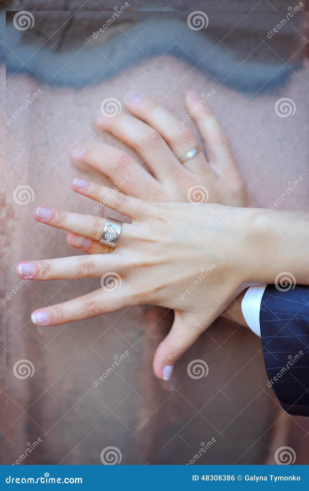 Hands of the Bride and Groom with Wedding Rings Stock Photo - Image of ...