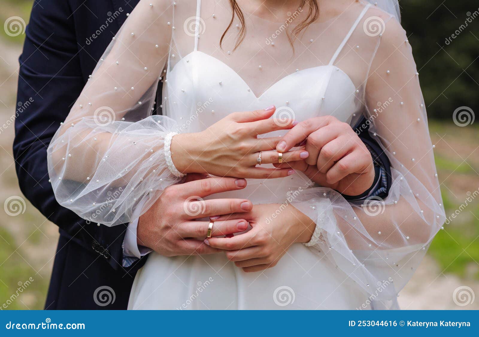 Hands of Brides with Gold Wedding Rings Close Up Stock Photo - Image of ...