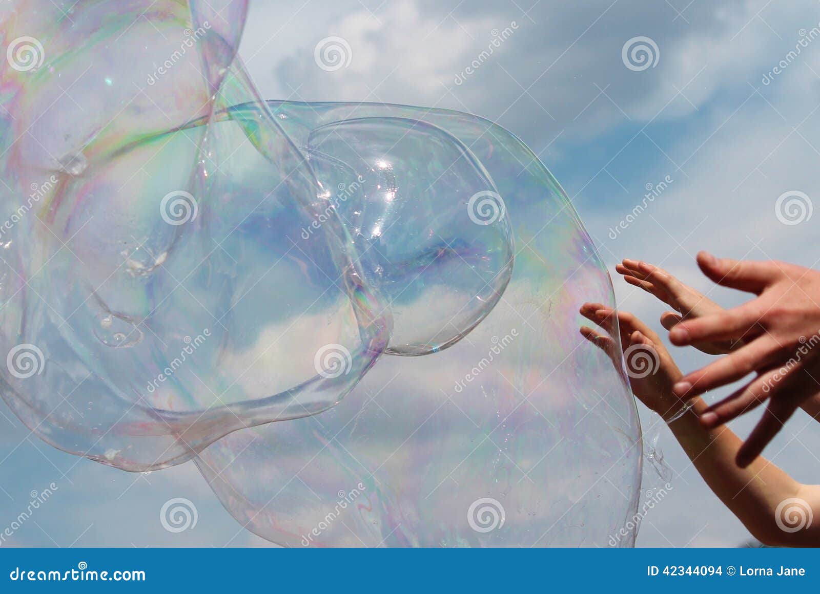 Bubble Hands and Bubbles Against the Sky Stock Photo - Image of ...