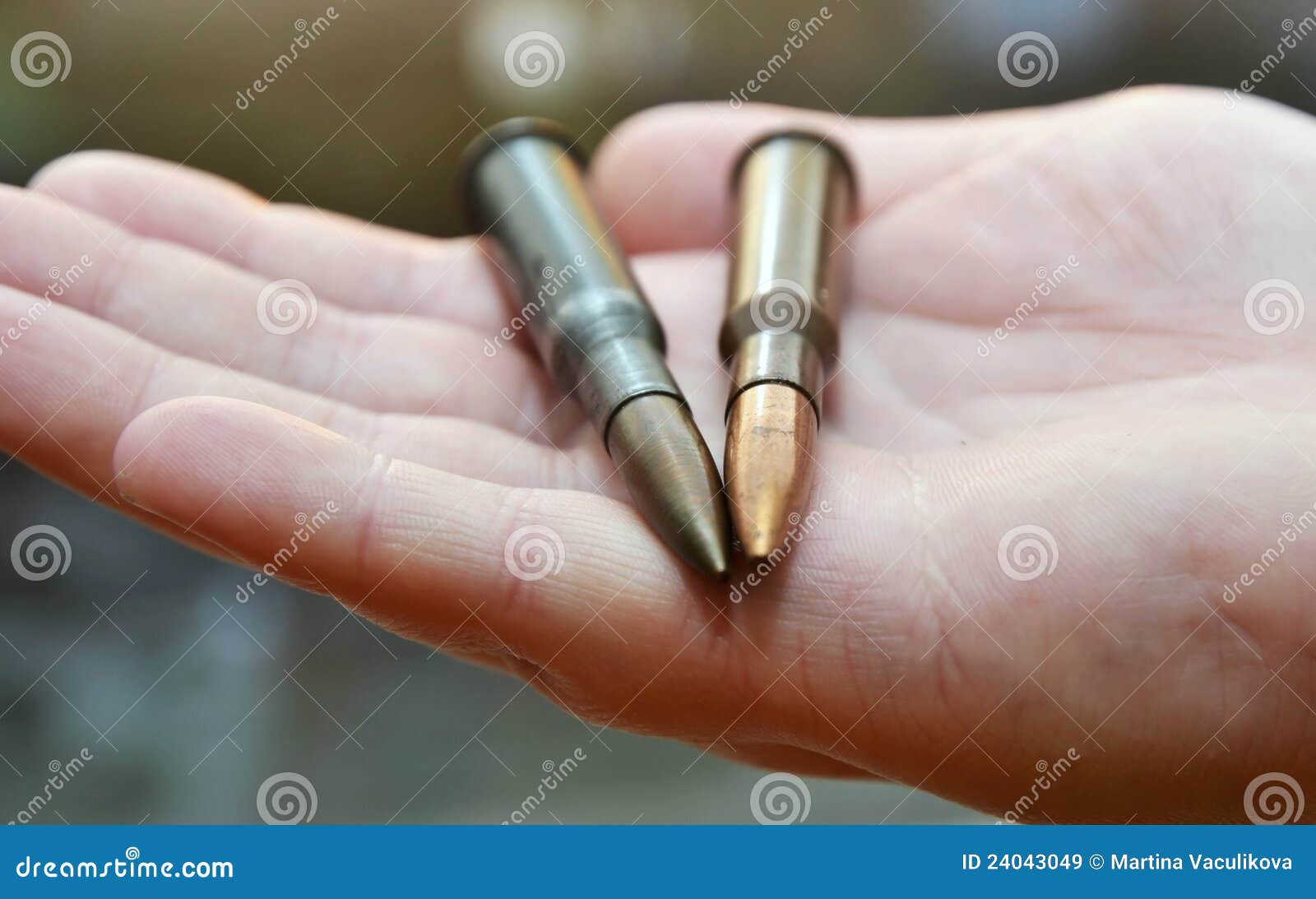Hands of bullets stock image. Image of ammunition, copper - 24043049