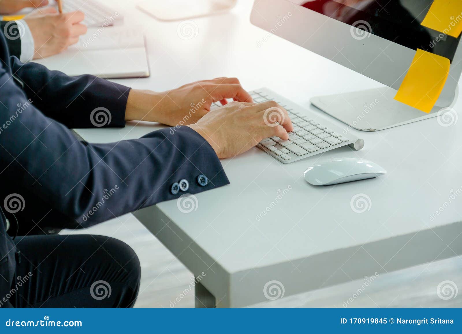 Hands of Business Man Types Some Data or Information To Computer during ...