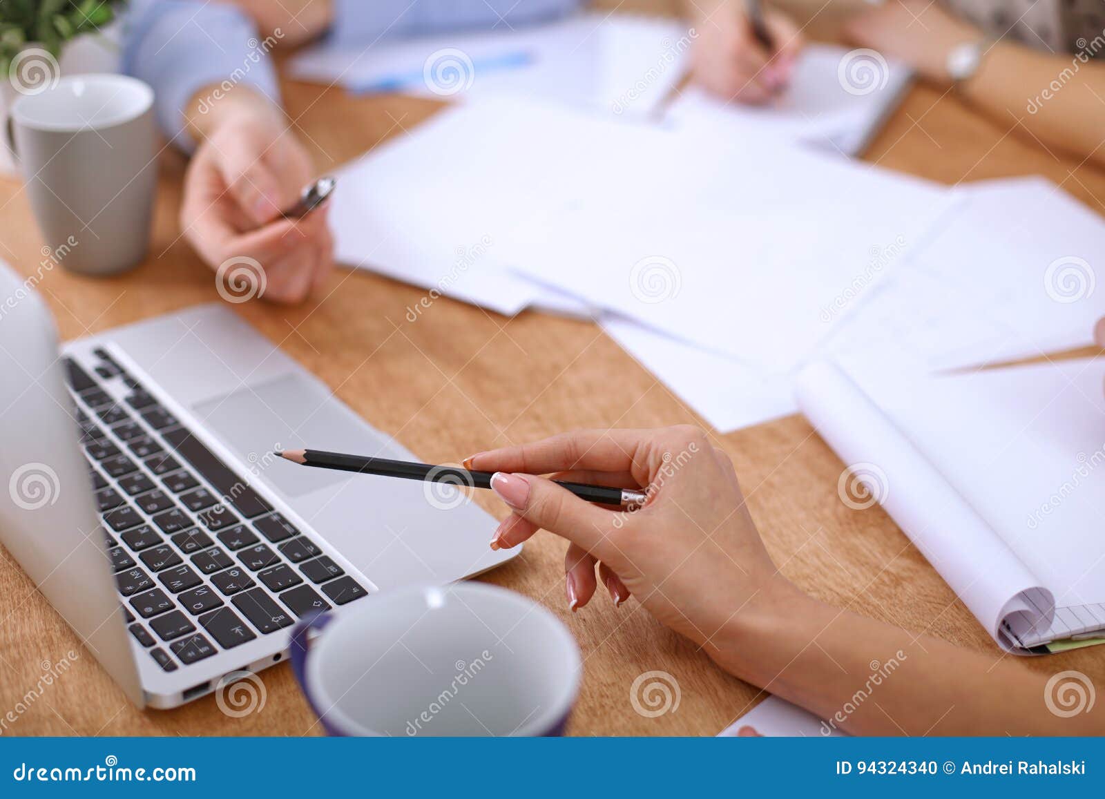 Hands of Business People Meeting Around Table Stock Photo - Image of ...