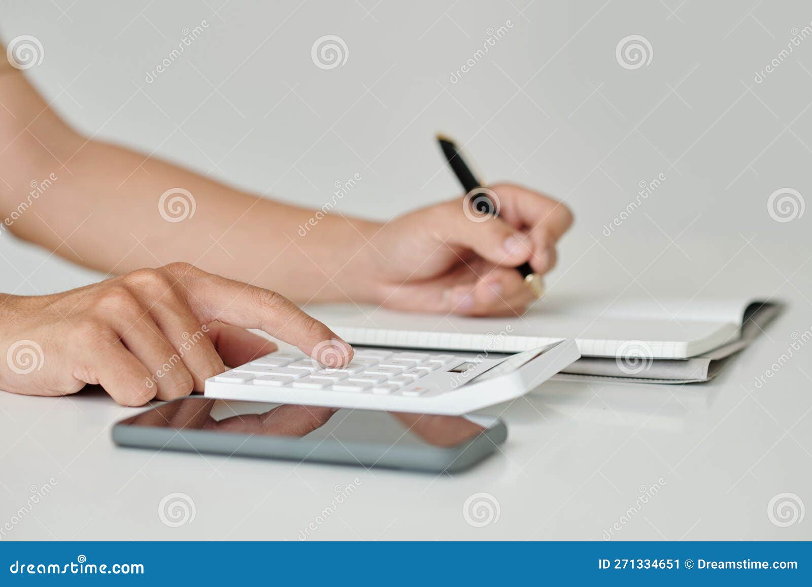 Businessman Making Calculations Stock Image - Image of businesswoman ...