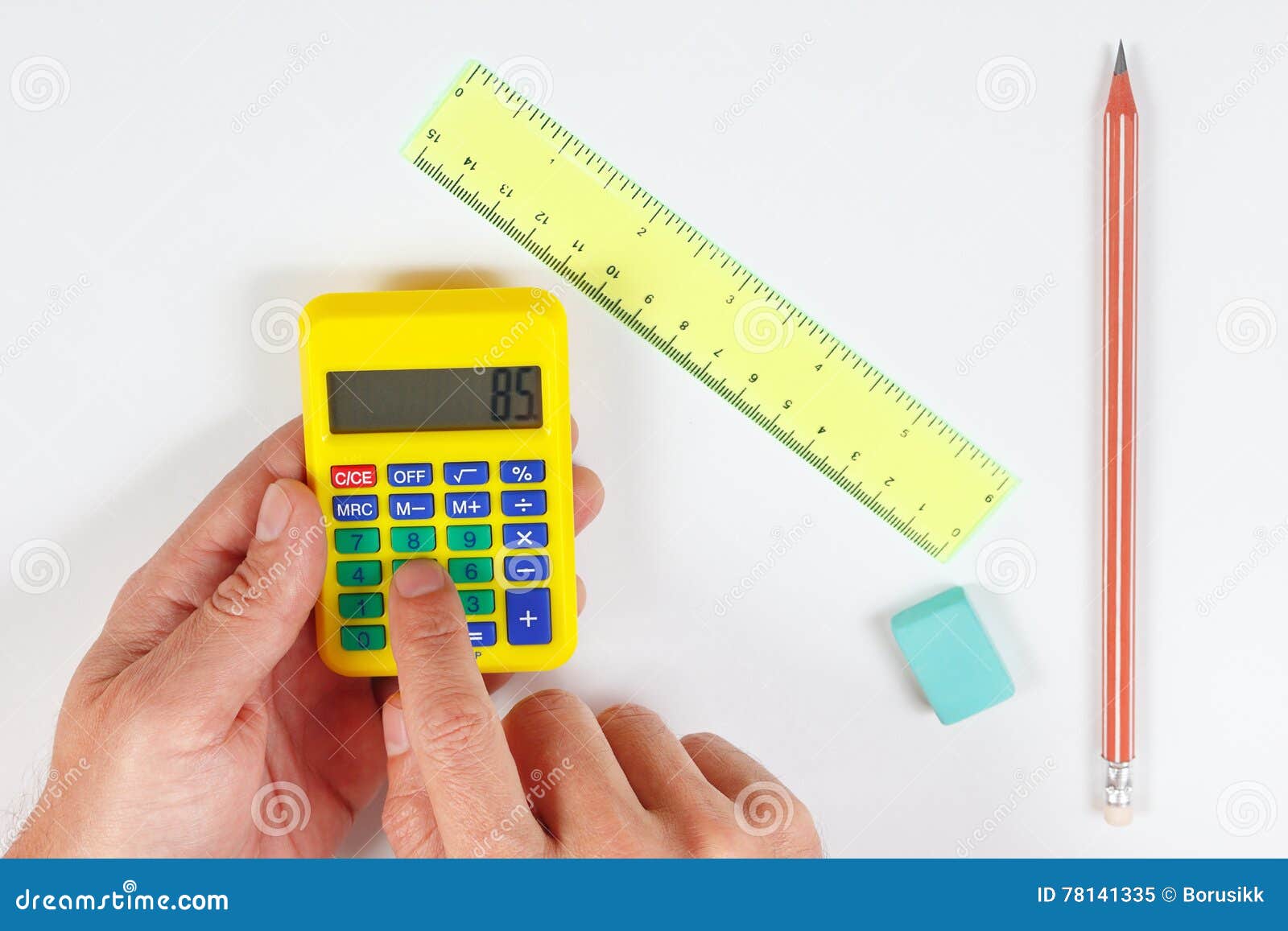 Hands Calculate Using a Pocket Digital Calculator Over a Workplace of ...