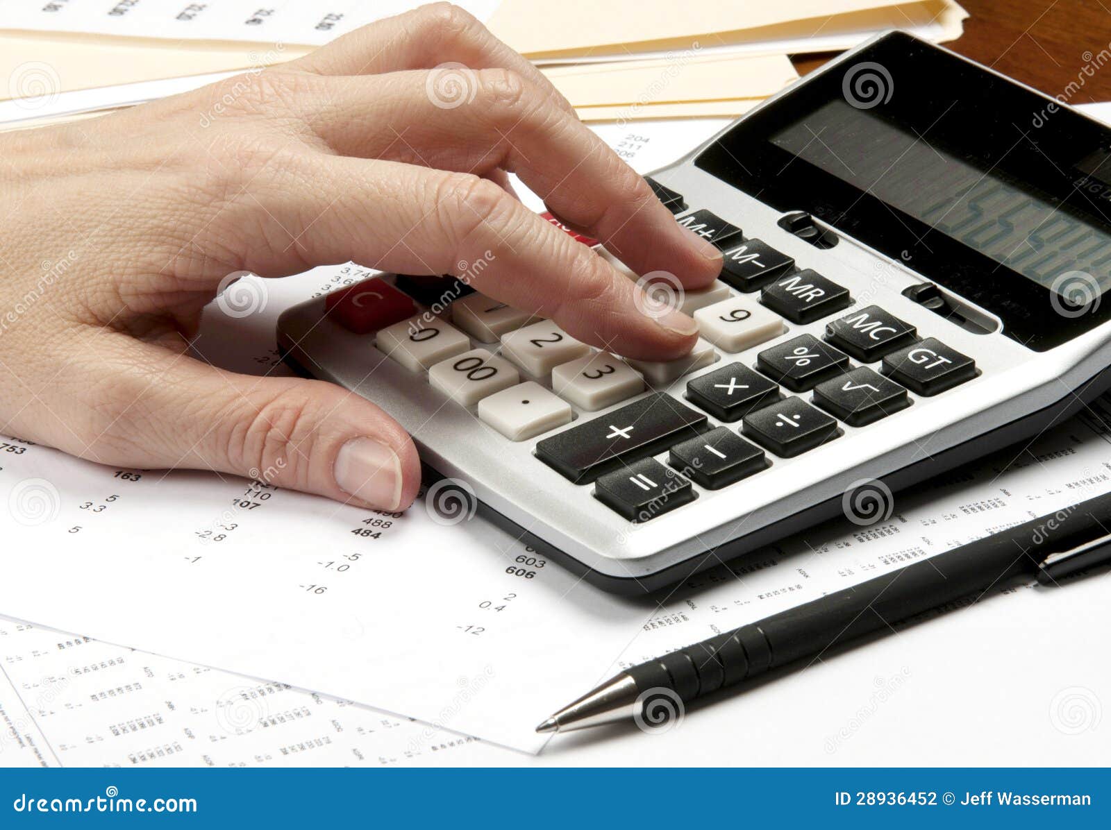 Hands on Calculator with Pen and Financial Papers Stock Photo - Image ...