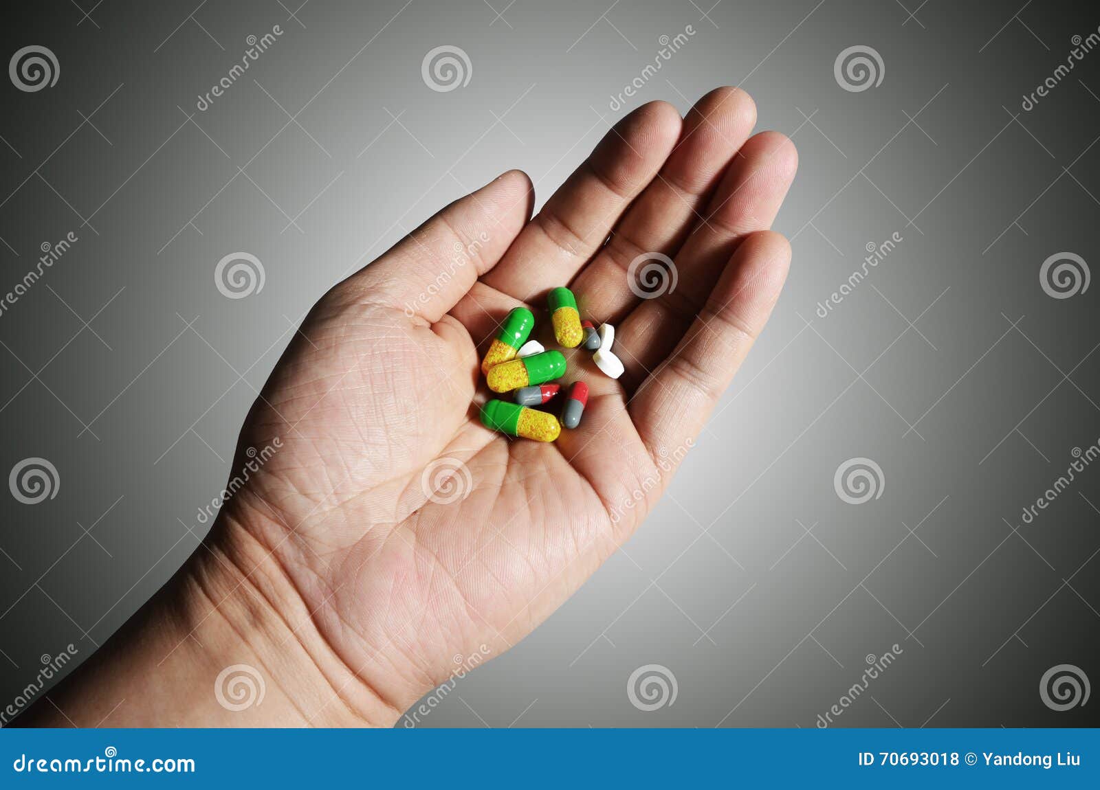 In the Hands of the Capsule Stock Photo - Image of hand, capsule: 70693018