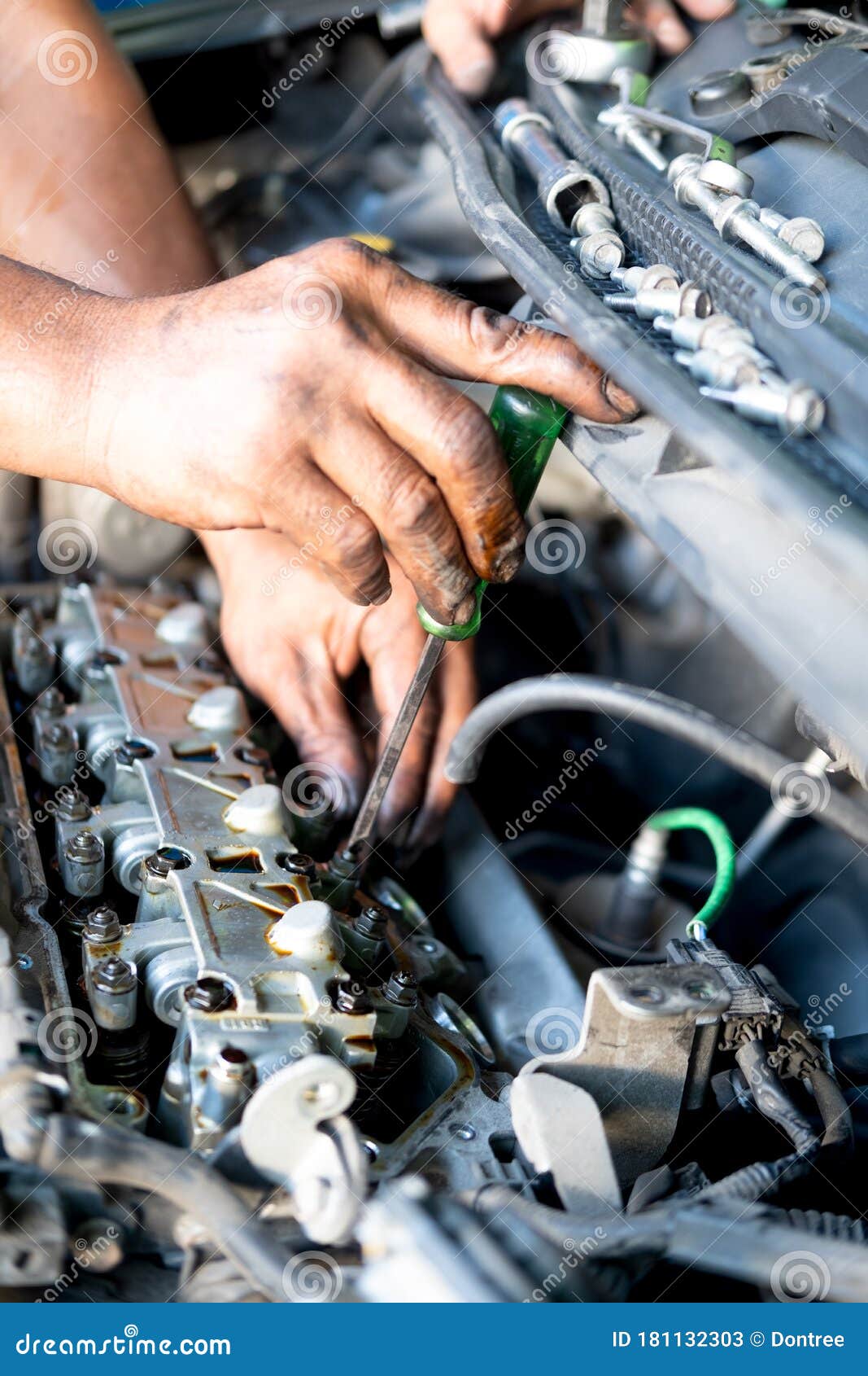 Hands of Car Mechanic with Screwdriver Stock Image - Image of pouring ...