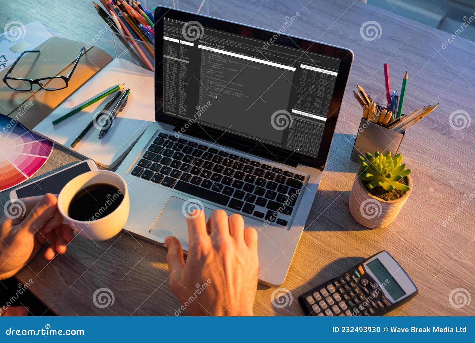 Hands Of Caucasian Male Programmer Sitting At Desk And Using Laptop With Coding On Screen Stock