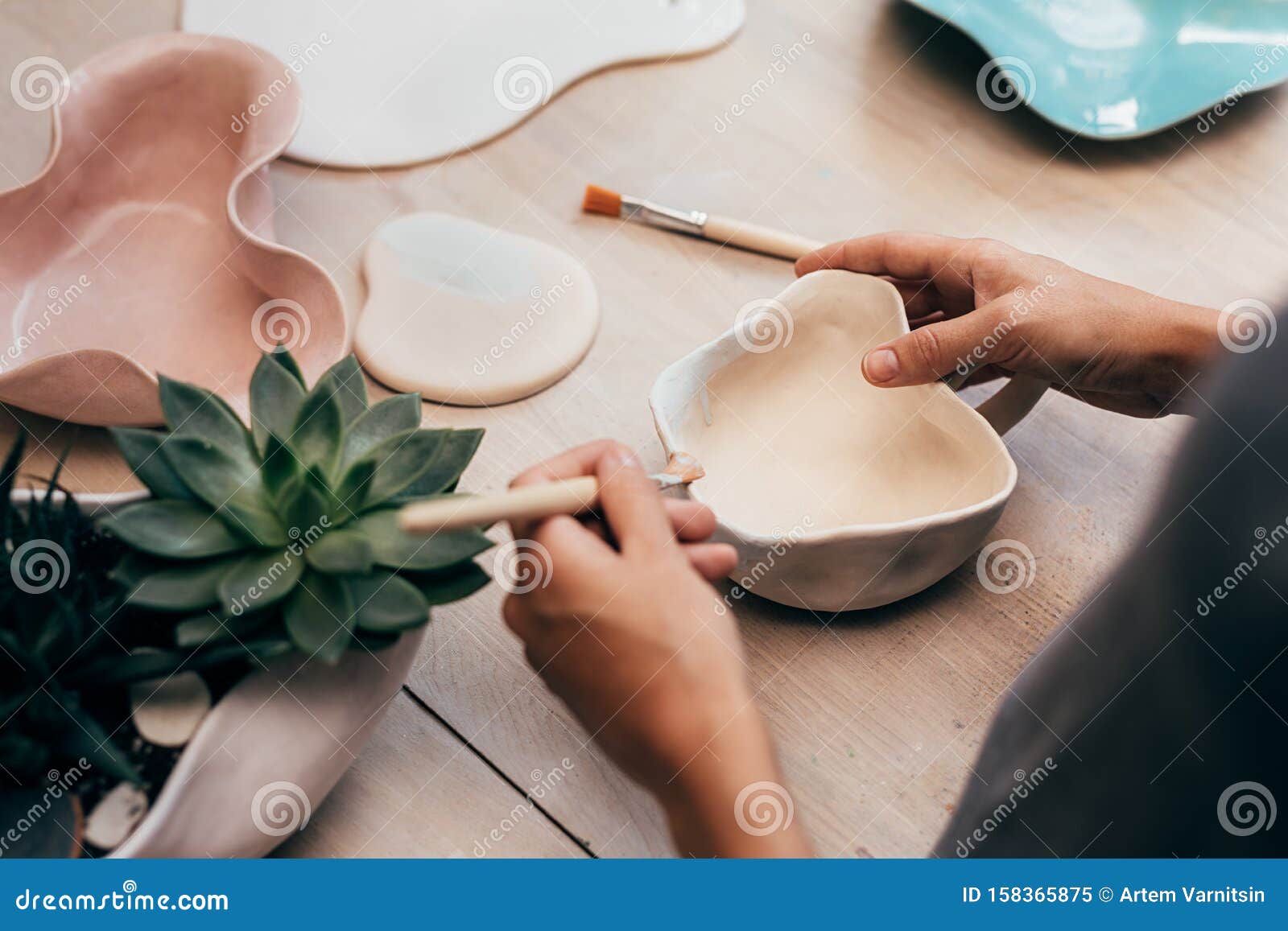 Hands of Ceramist Painting a Bowl Stock Image - Image of bowl, potter ...