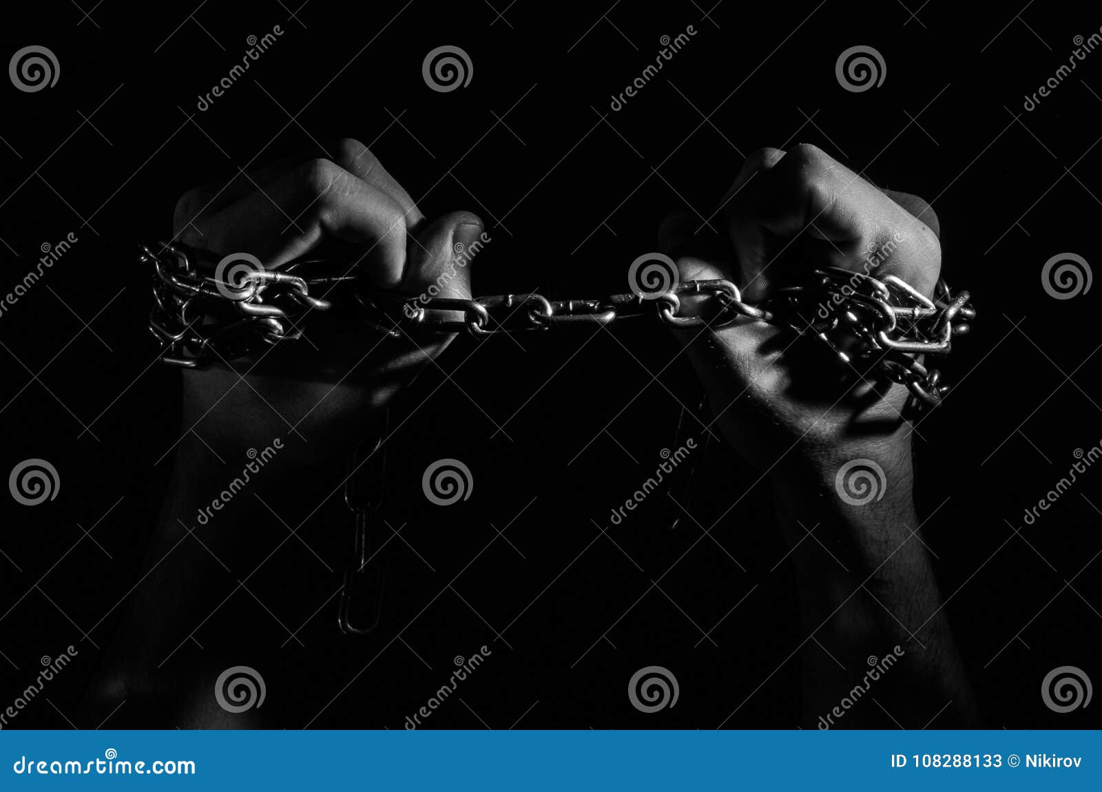 Hands are Chained in Chains Isolated on Black Background Stock Image ...