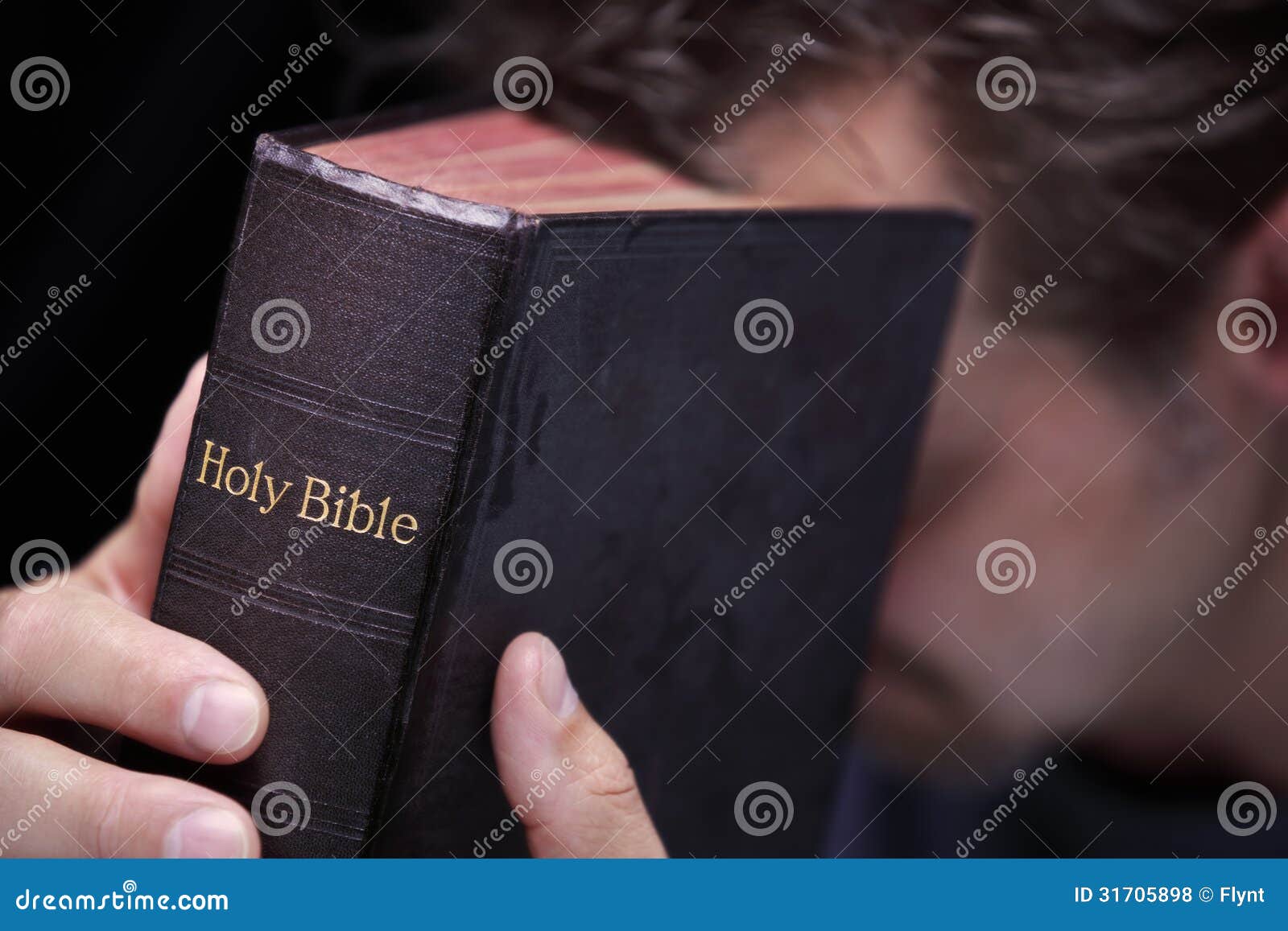 Hands Clasped in Prayer Around Holy Bible Stock Photo - Image of hope ...