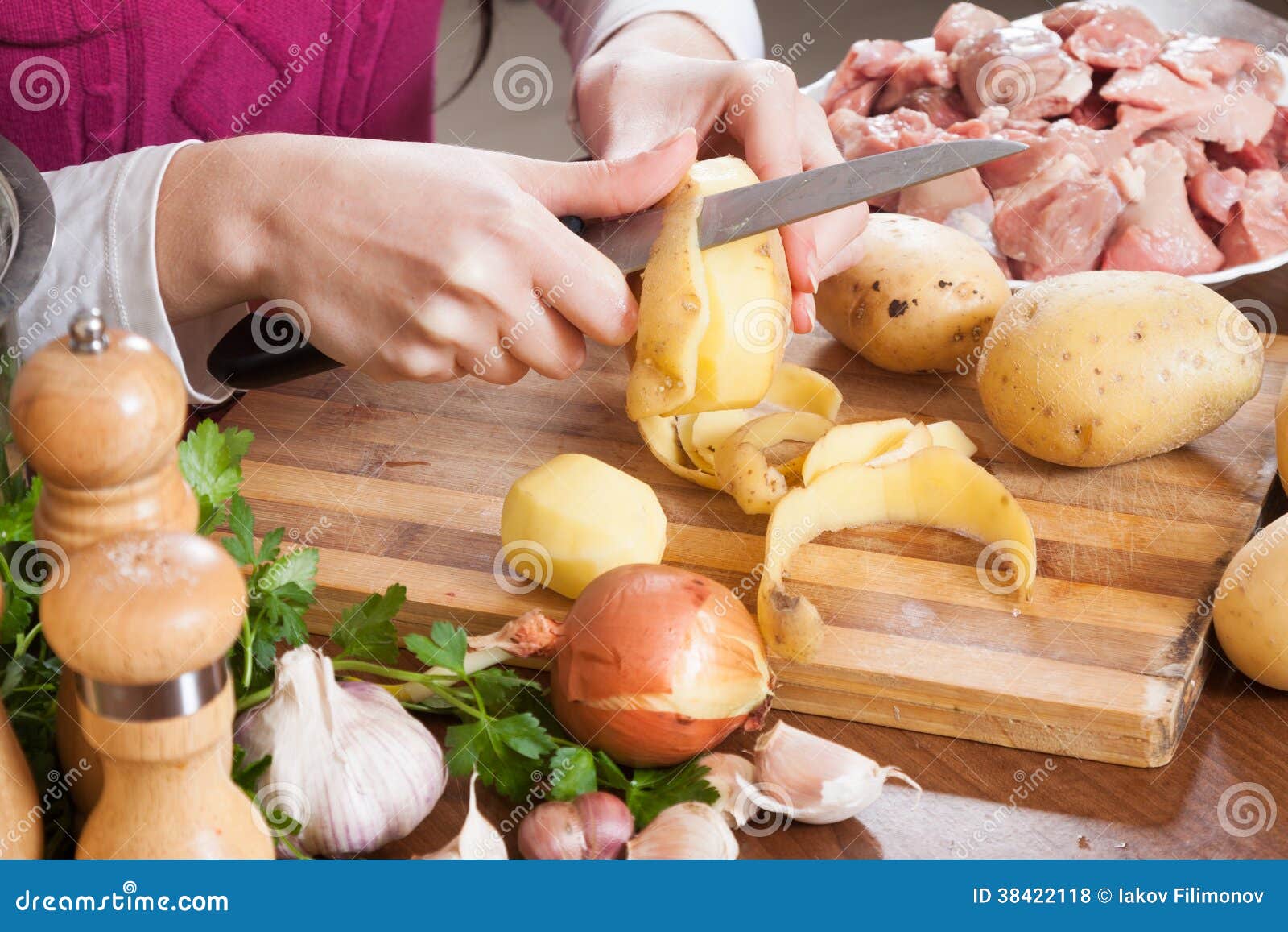 Hands Cleaning Potatoes at Table in Kitchen Stock Photo - Image of food ...