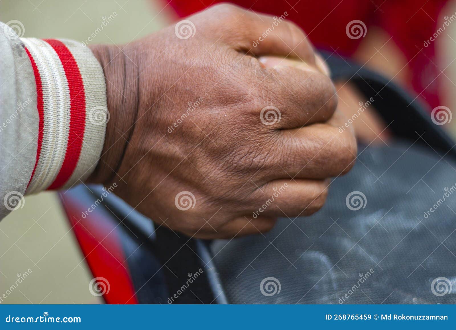 Hands are Clenched and the Background is Blurred Stock Image - Image of ...