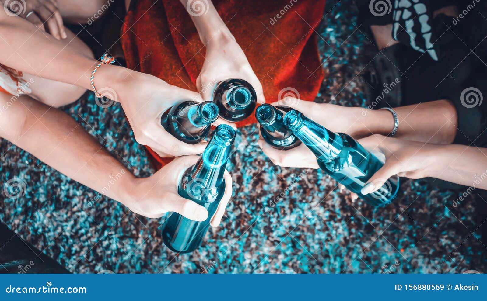 Hands Clinking Bottle of Beer Together in Celebration Party Stock Image ...