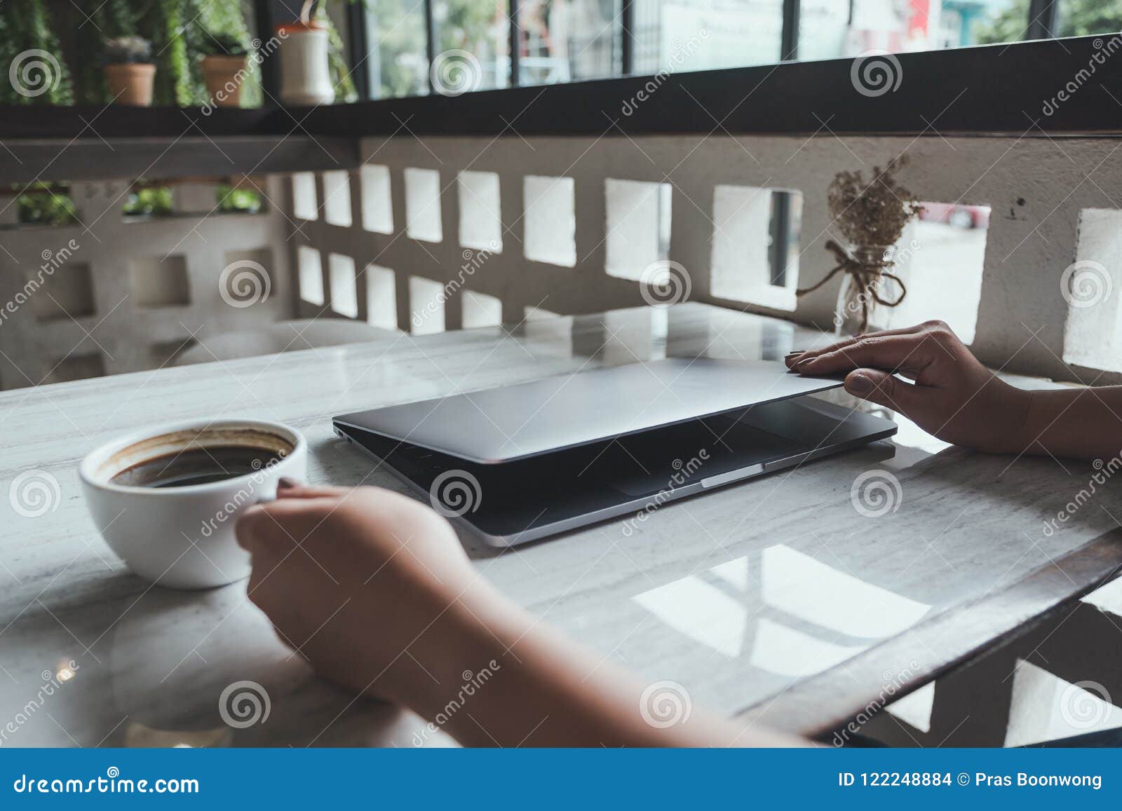 Hands Close and Open a Laptop Computer on Table after Finished Using it ...