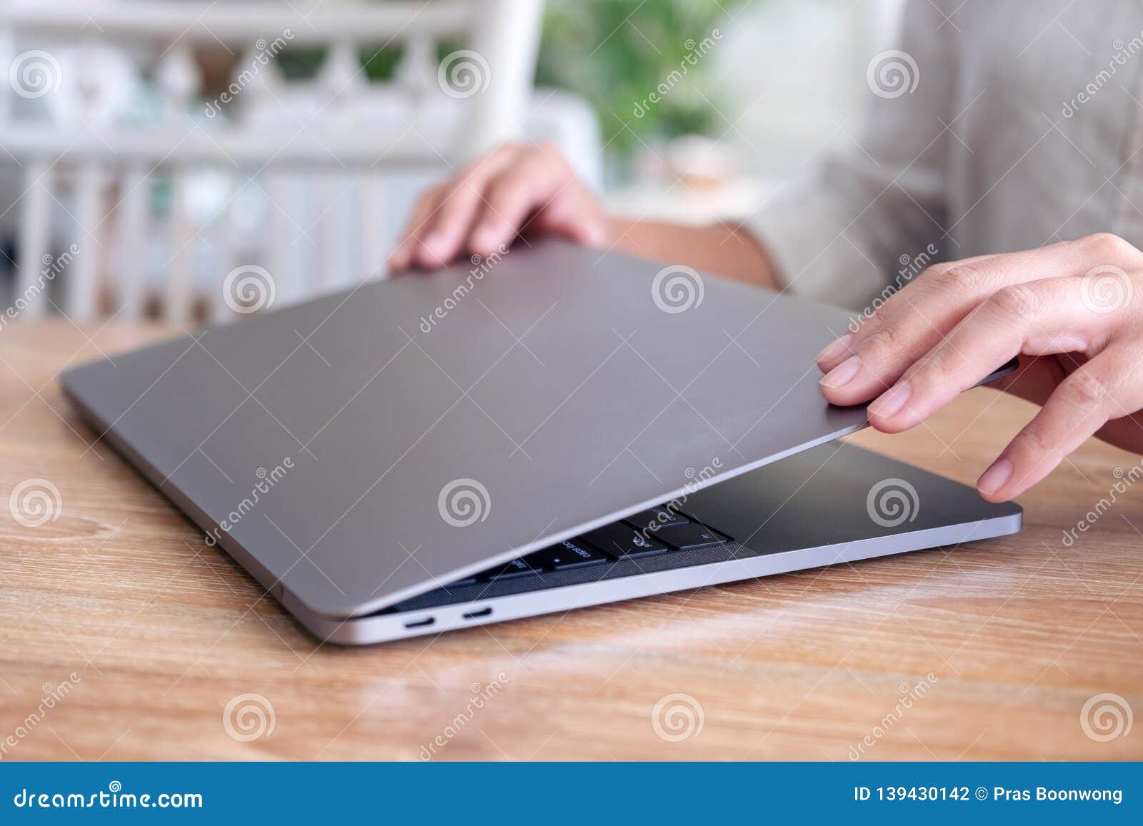 Hands Close and Open a Laptop Computer on Table after Finished Using it ...