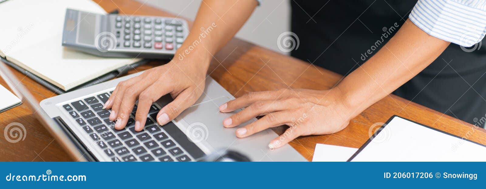 Hands Close Up Freelancer Busy Working on a Laptop Computer on Desktop ...