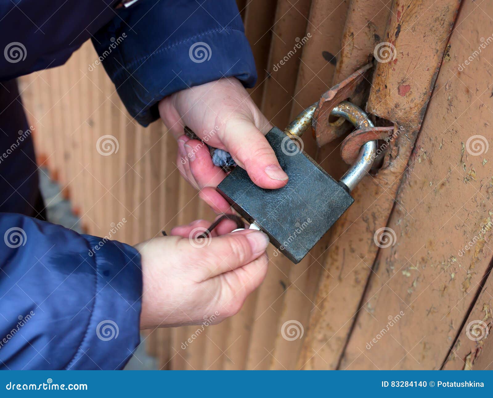Hands Closed Padlock Key on the Gate Stock Photo - Image of home ...