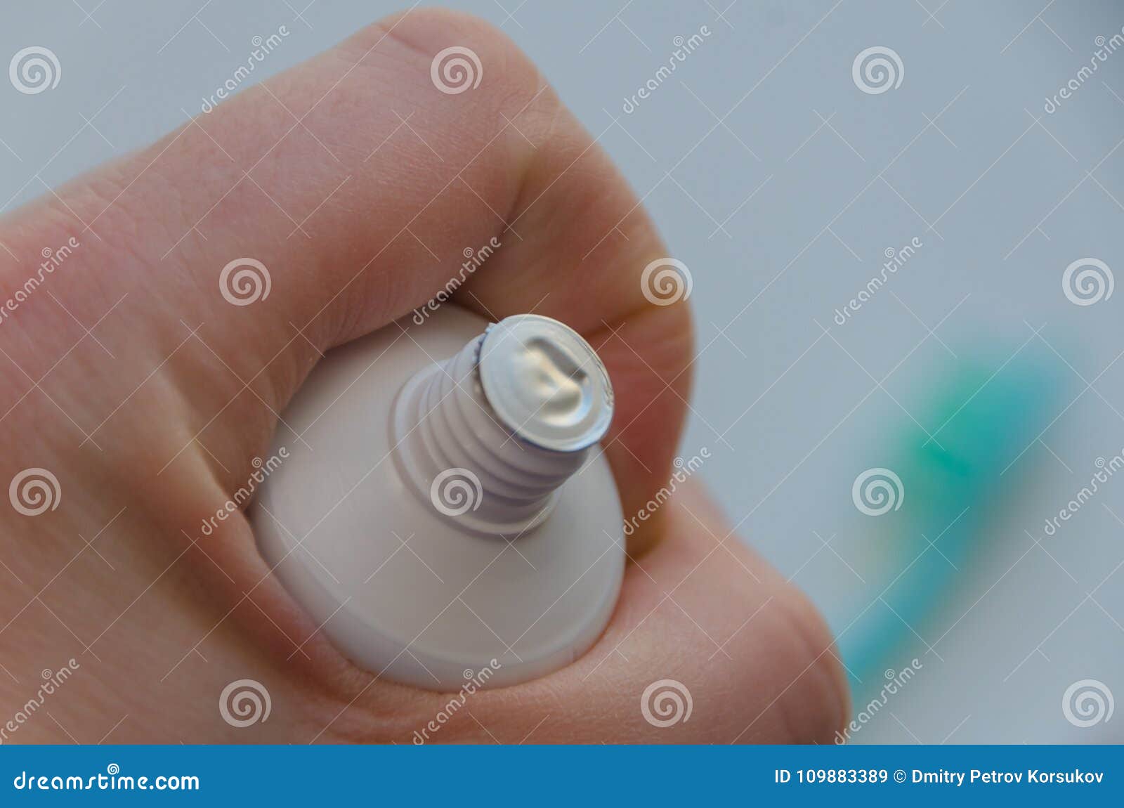 In the Hands of a Closed Toothpaste, Close-up Stock Image - Image of ...
