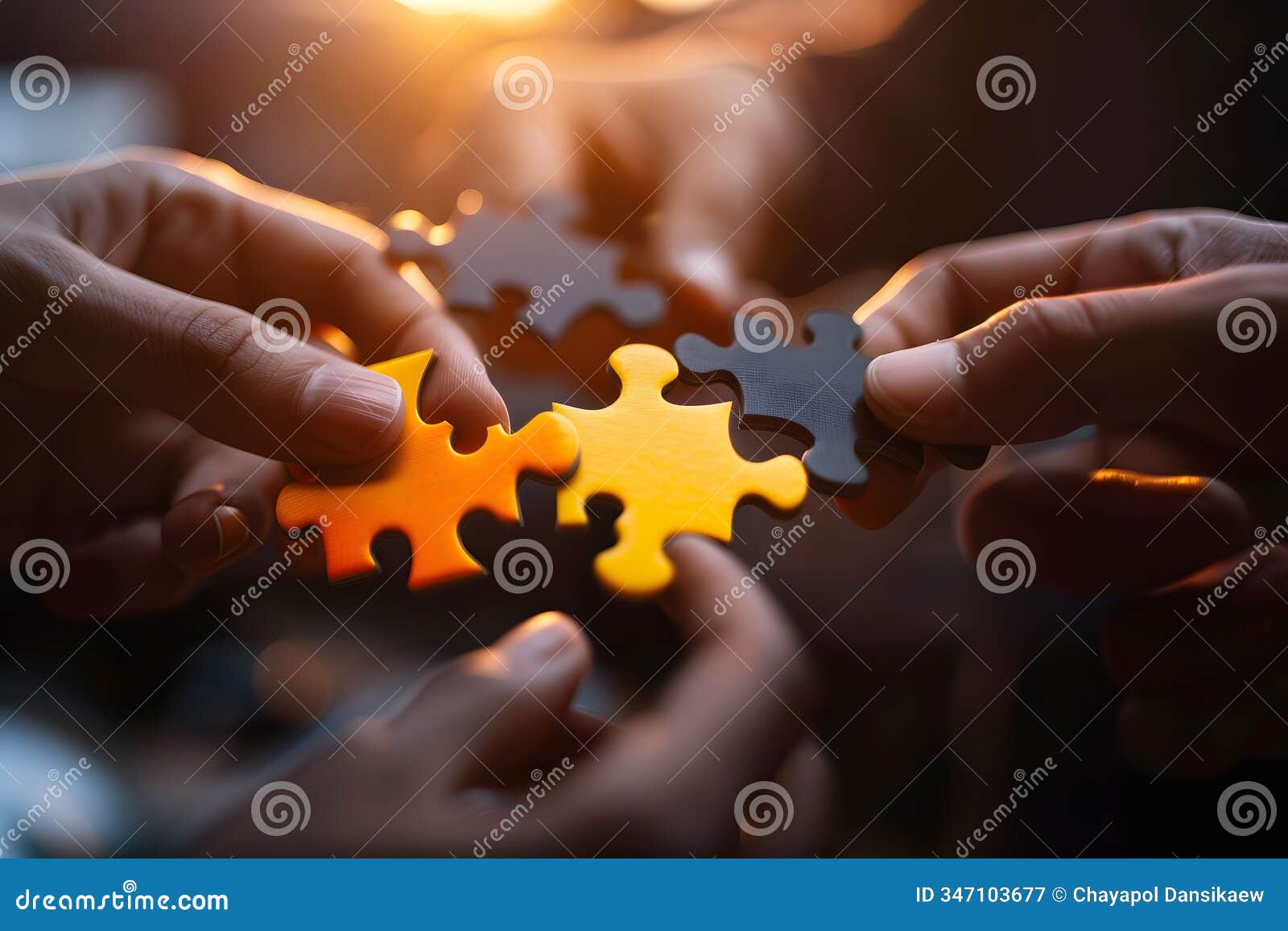 Hands Collaborating To Assemble Puzzle Pieces Symbolizing Teamwork ...