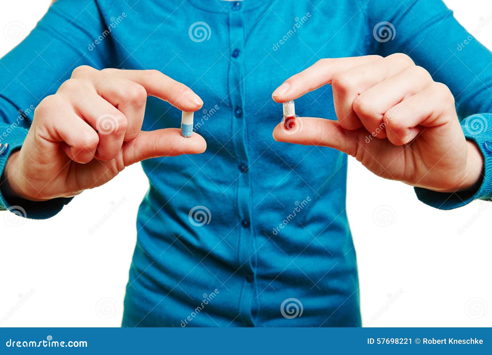 Hands comparing two pills stock image. Image of pills - 57698221