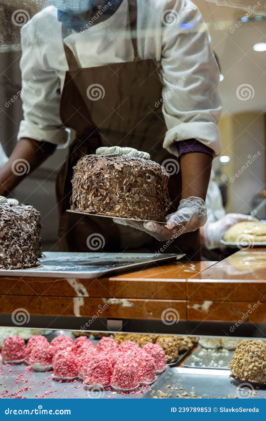 A Hands of Confectioner-chocolatier during at Work. the Making of Cake ...