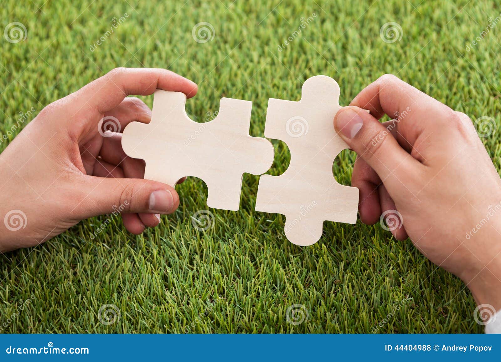 Hands Connecting Two Puzzle Pieces Stock Photo - Image of caucasian ...