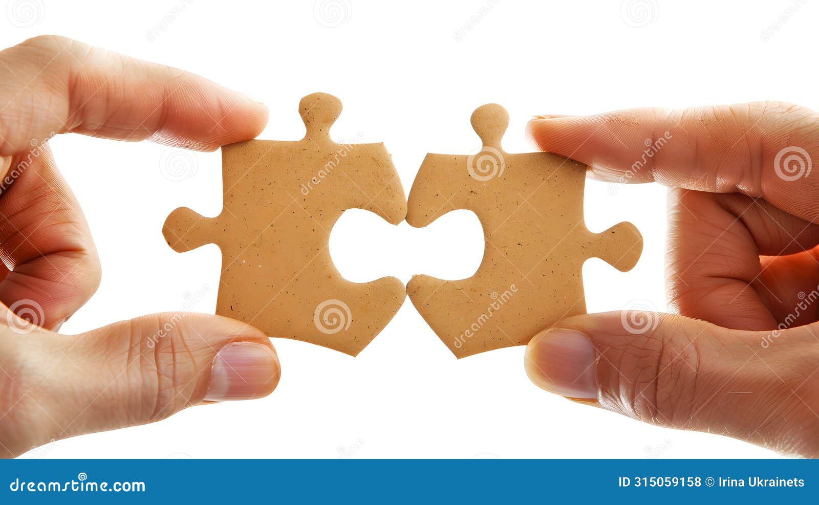 Hands Connecting Two Puzzle Pieces Together. Concept of Teamwork and ...