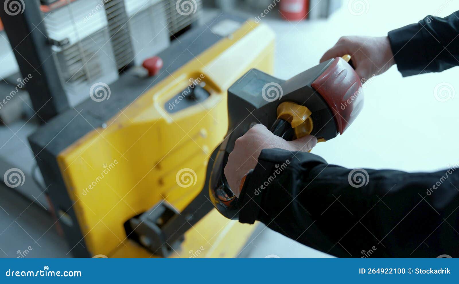 Hands on the Control Lever of a Hydraulic Stacker. a Worker Lifts Loads ...