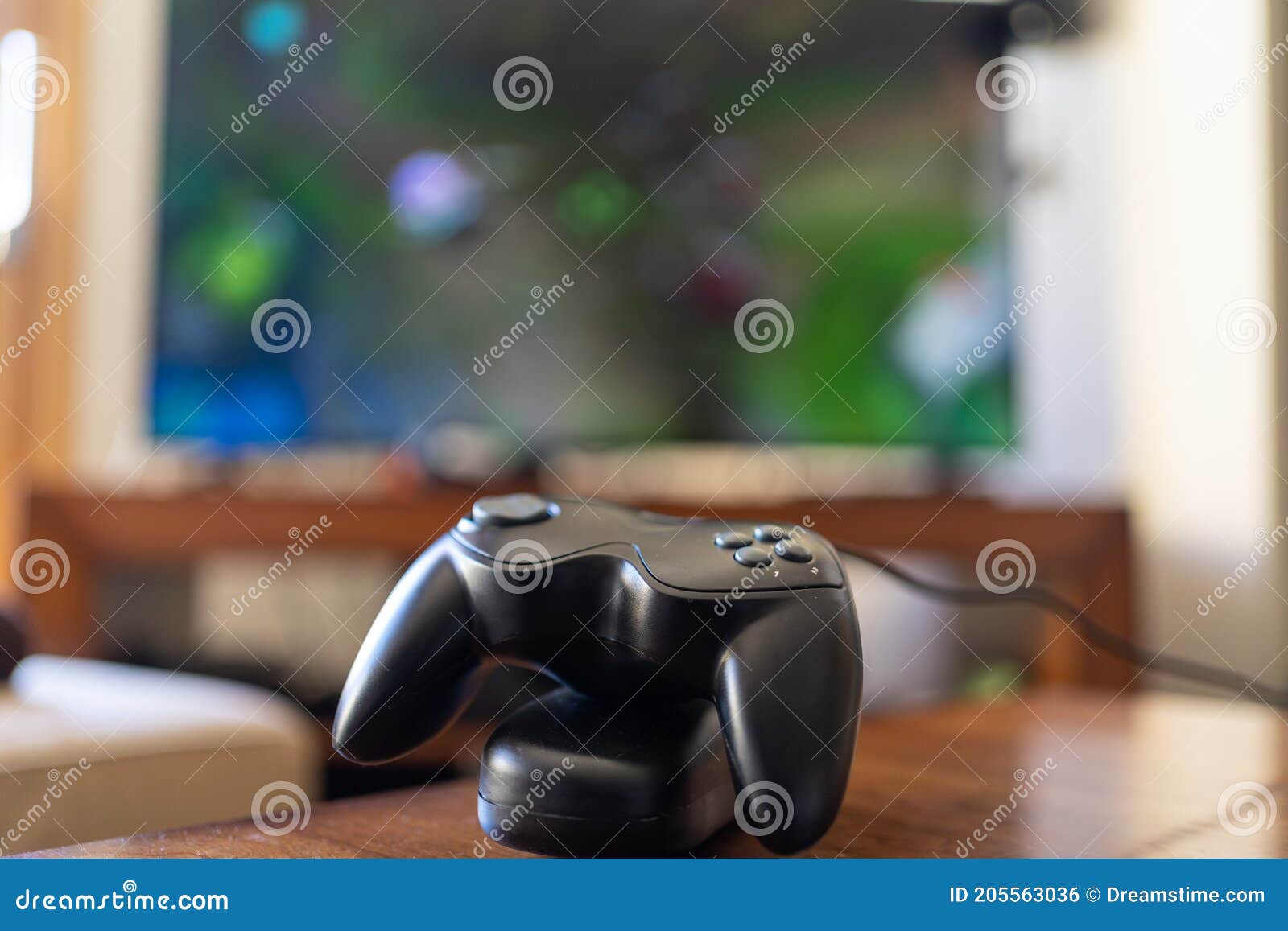 Hands with Controller on it Playing Video Games on TV Stock Photo ...