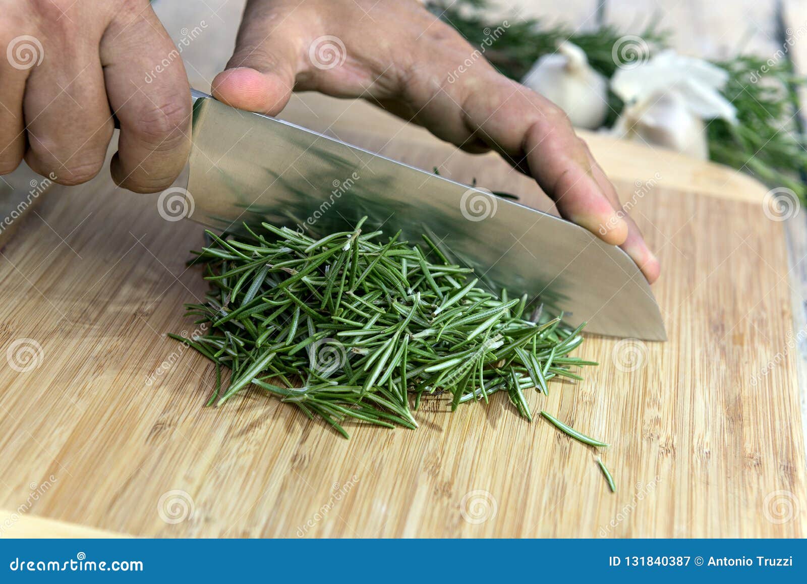 Chopping Rosemary with Knife on Cutting Board Stock Image - Image of ...