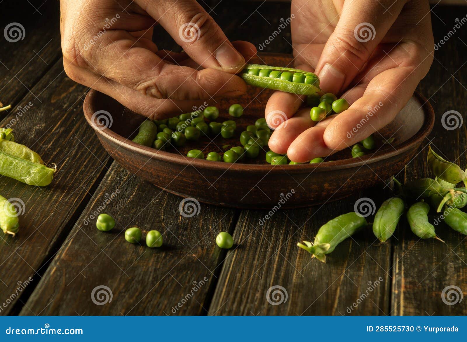 The Hands of the Cook Clean the Pods of Green Peas. Work Environment on ...